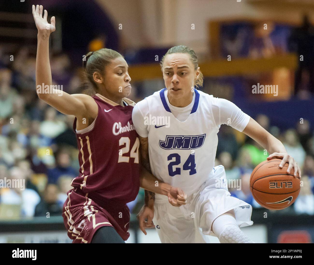 James Madison guard Jazmon Gwathmey, right, drives around College of ...