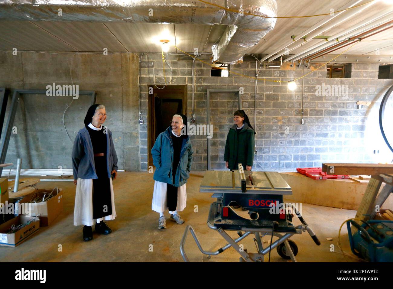 Sister Barbara Smickel, left, Mother Marion Rissetto, center, and ...
