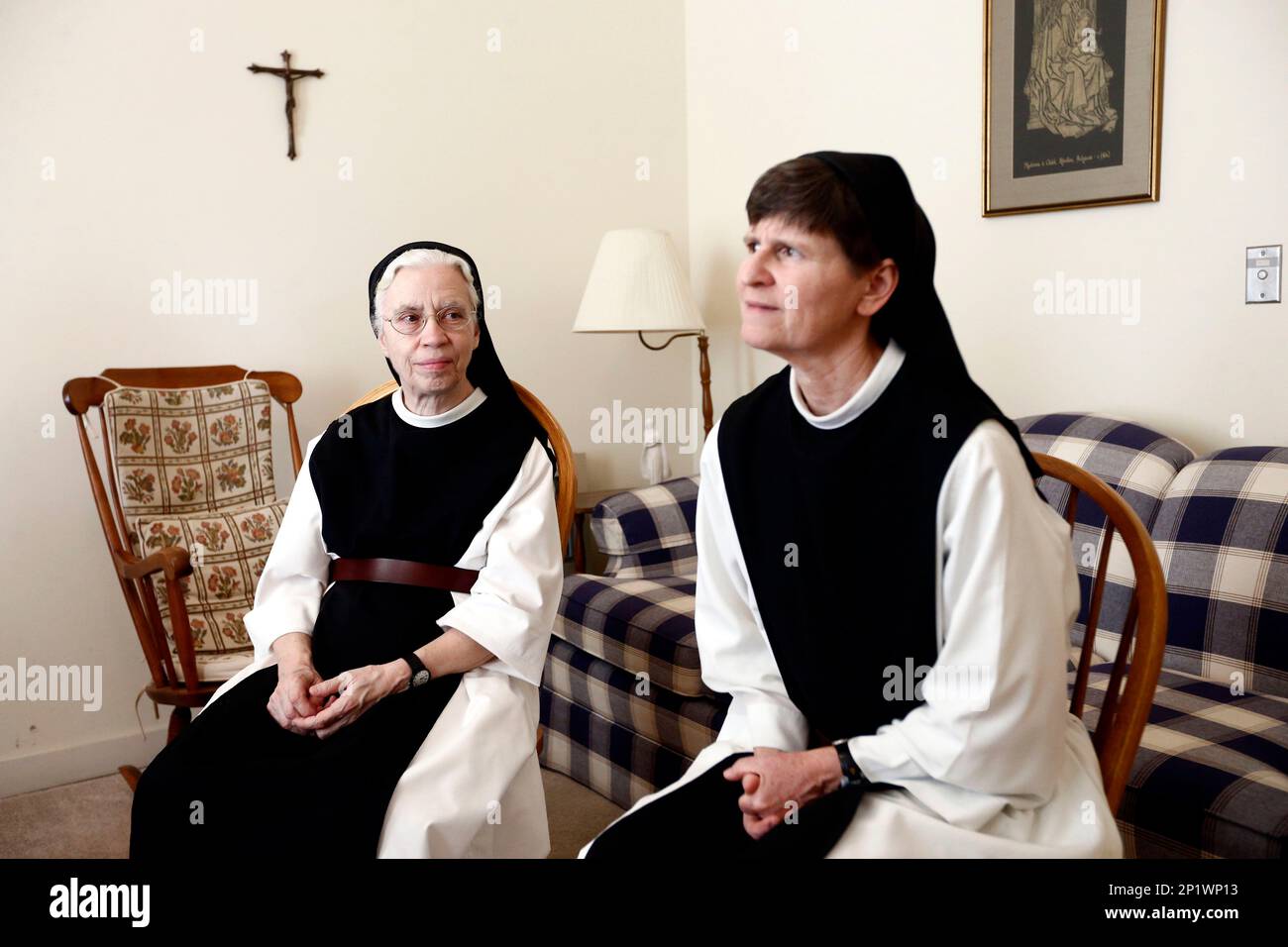 Mother Marion Rissetto, left, and Sister Kathy Ullrich, right, talk ...