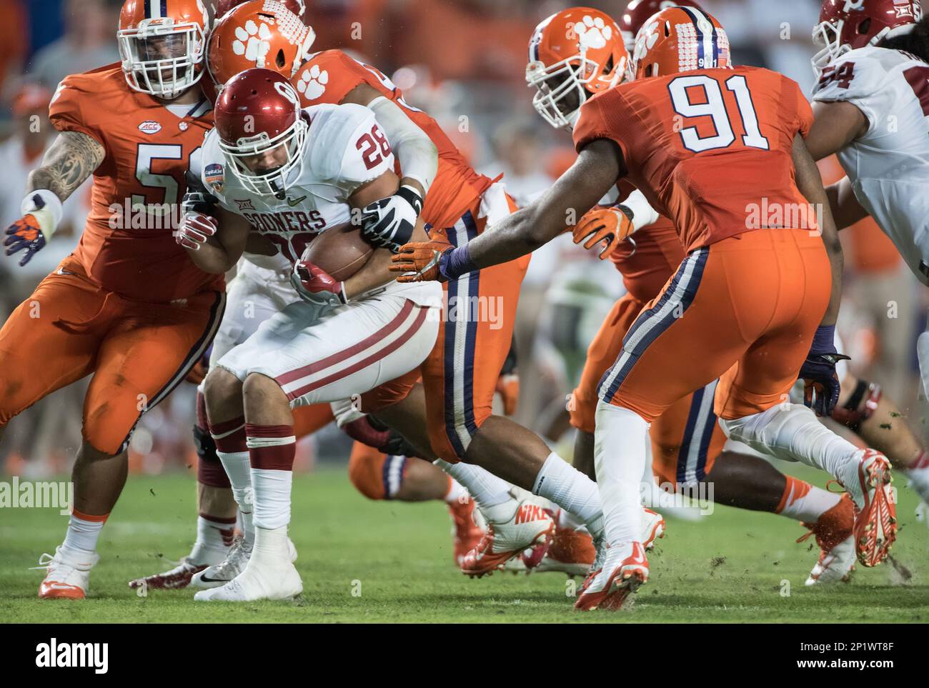 31 December 2015: Oklahoma Sooners running back Alex Ross (28) battles ...