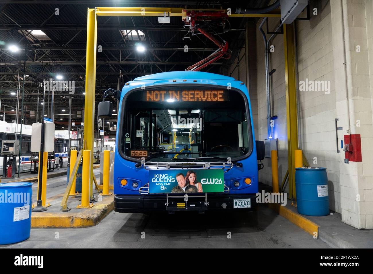 A Chicago Transit Authority electric bus charges in the West Side ...