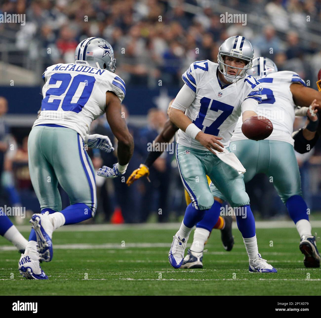 Dallas Cowboys quarterback Kellen Moore (17) makes a pass to Darren ...