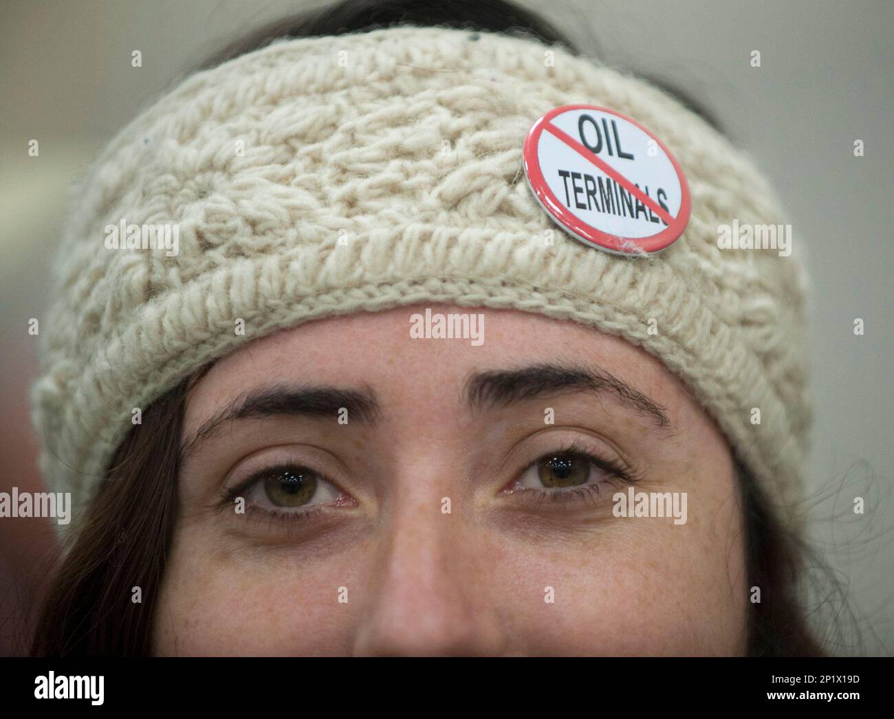 Erin Murdock wears a button indicating her opposition to the building ...