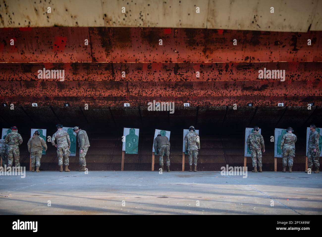 U.S. Airmen assigned to the 60th Air Mobility Wing review their targets ...