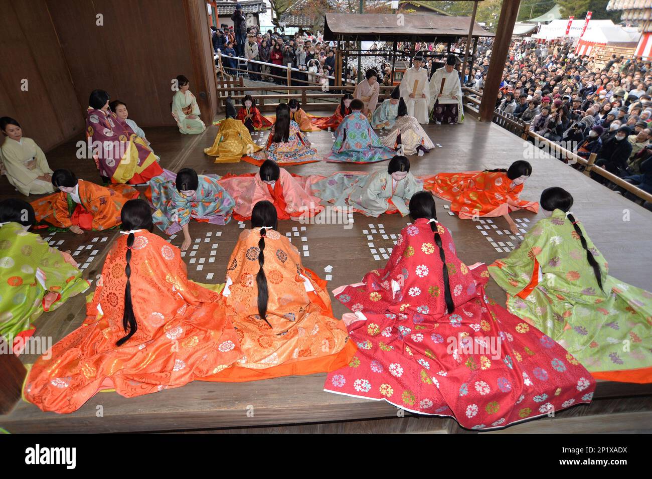 18 female and men wearing a Heian Period (794-1192) costume attend ...
