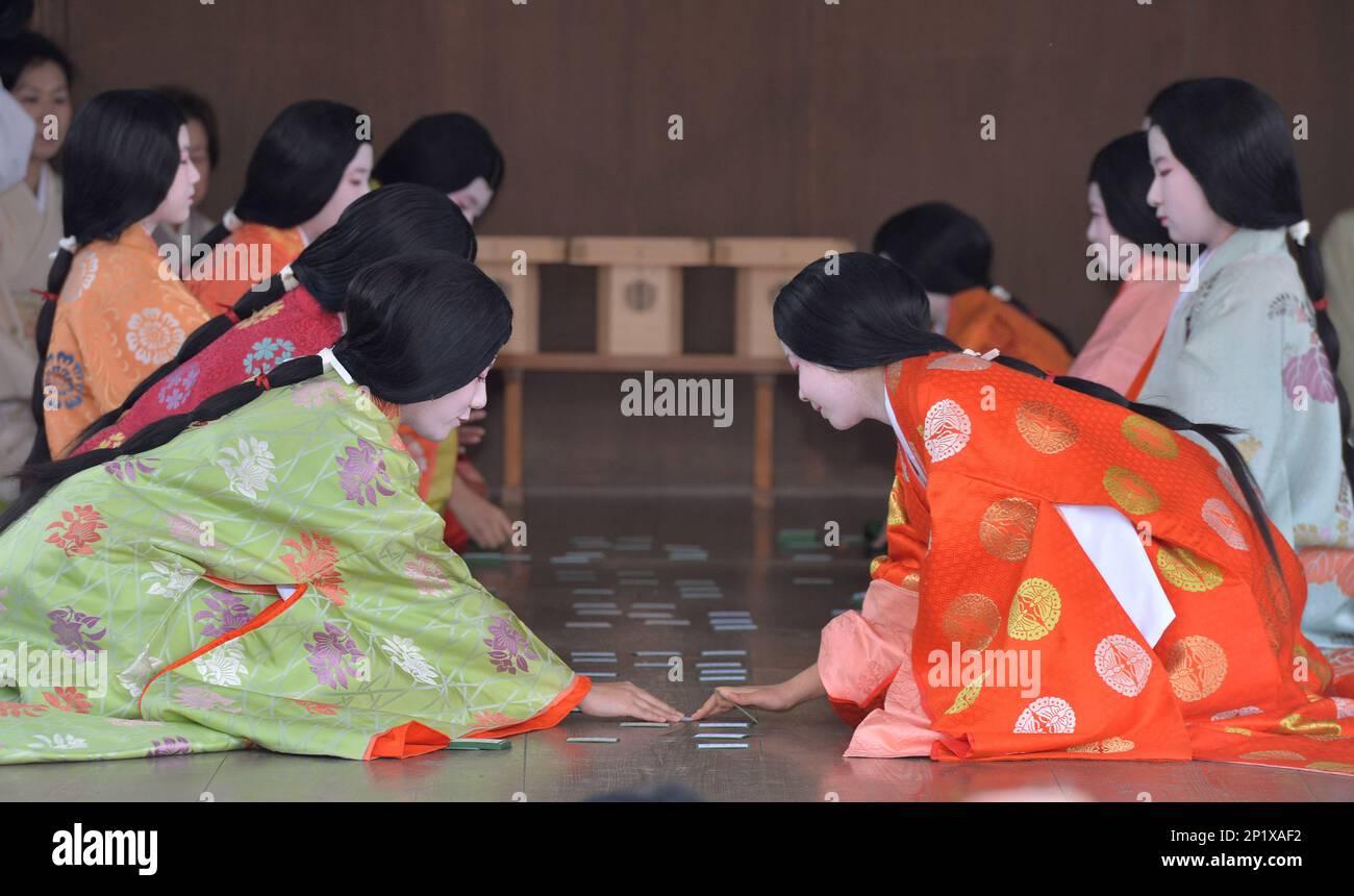 18 female and men wearing a Heian Period (794-1192) costume attend ...