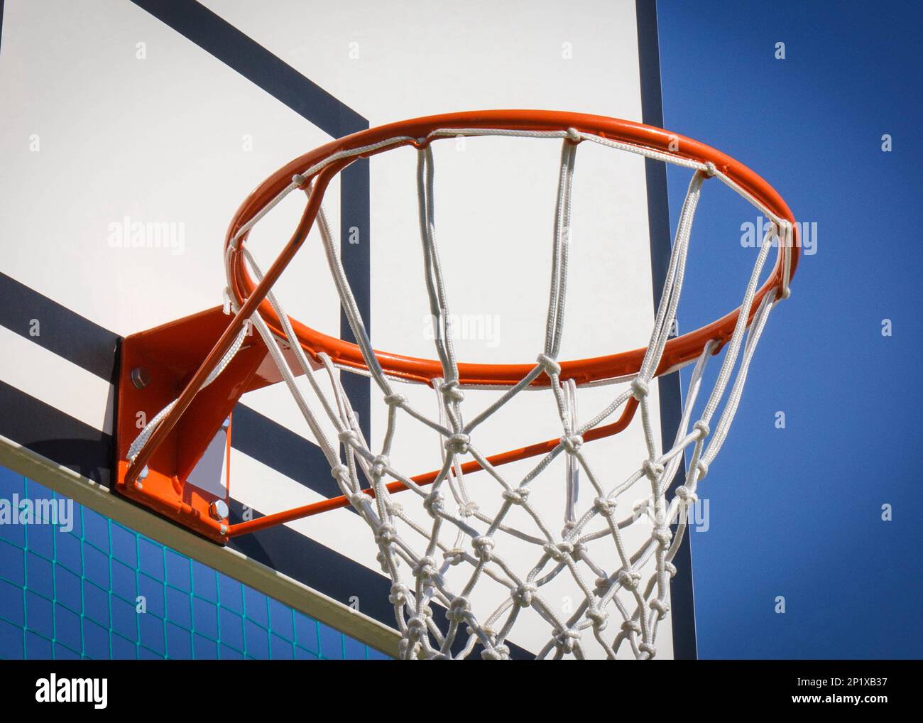 Basketball board with hoop on sky background. Sport and recreation time ...