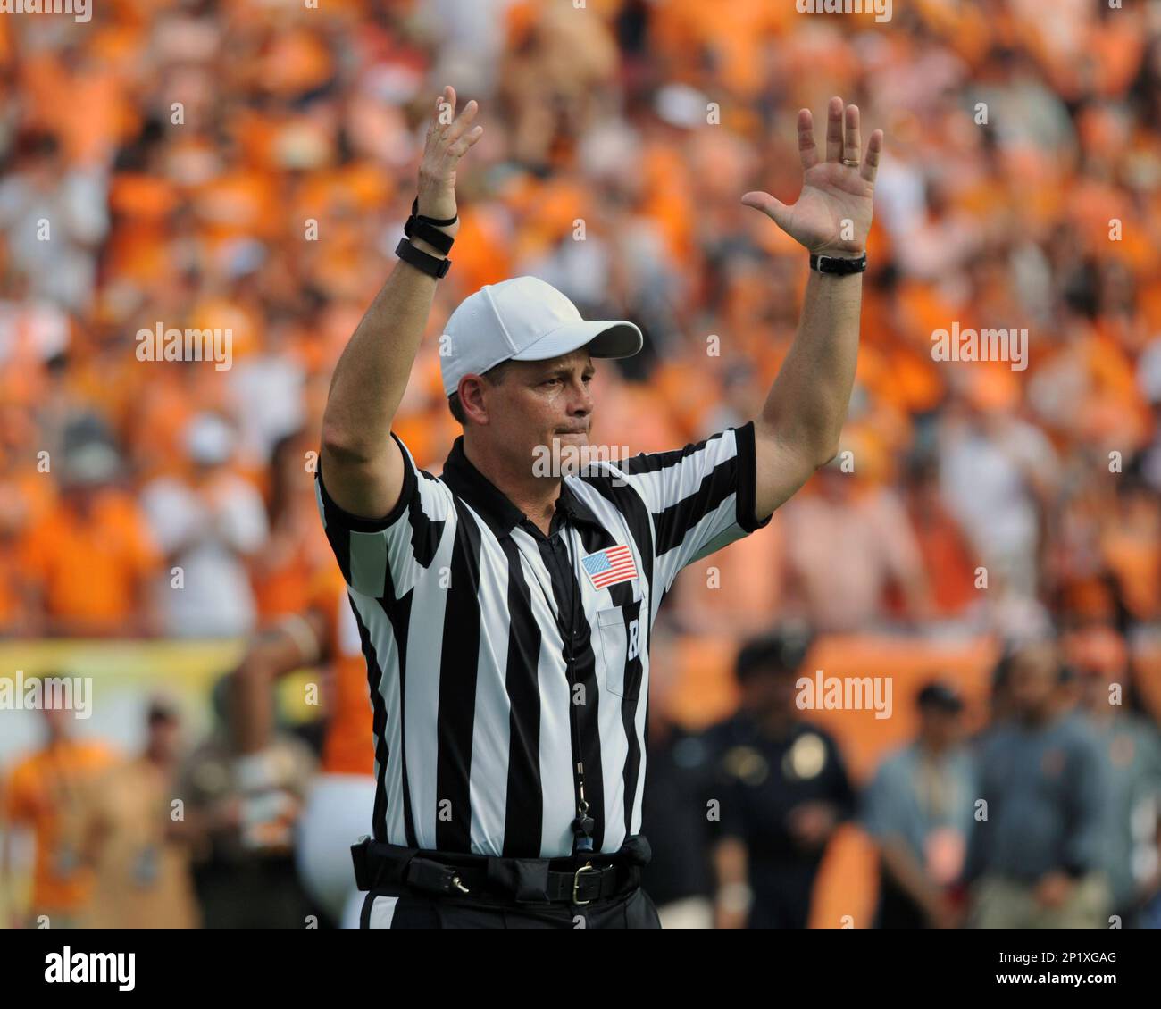 Atlantic Coast Conference referee Gary Patterson signals a touchdown as ...