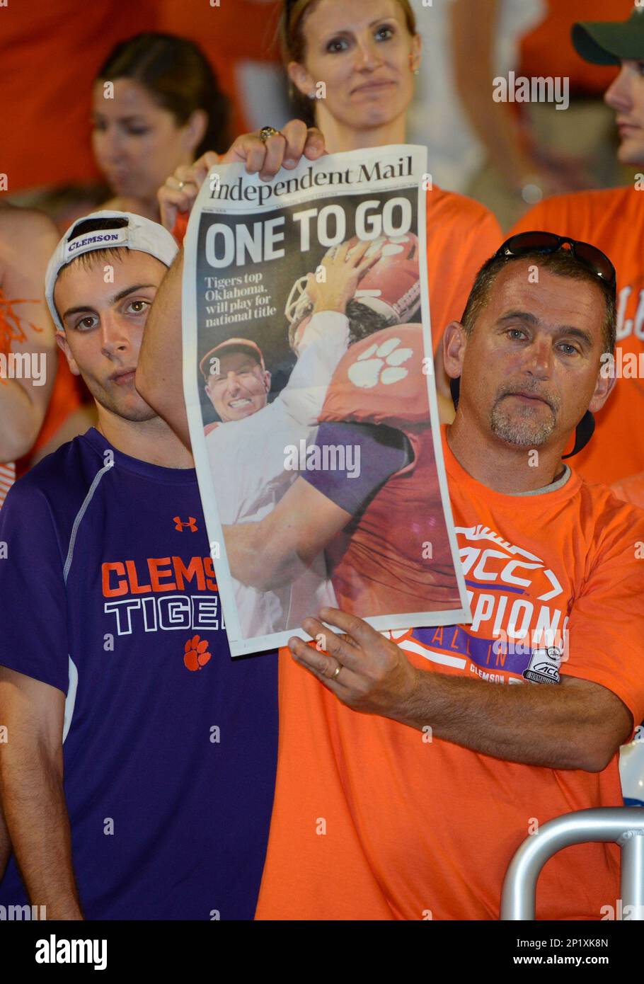 31 December 2015: Clemson fan holds a newspaper stating "One to Go" in ...