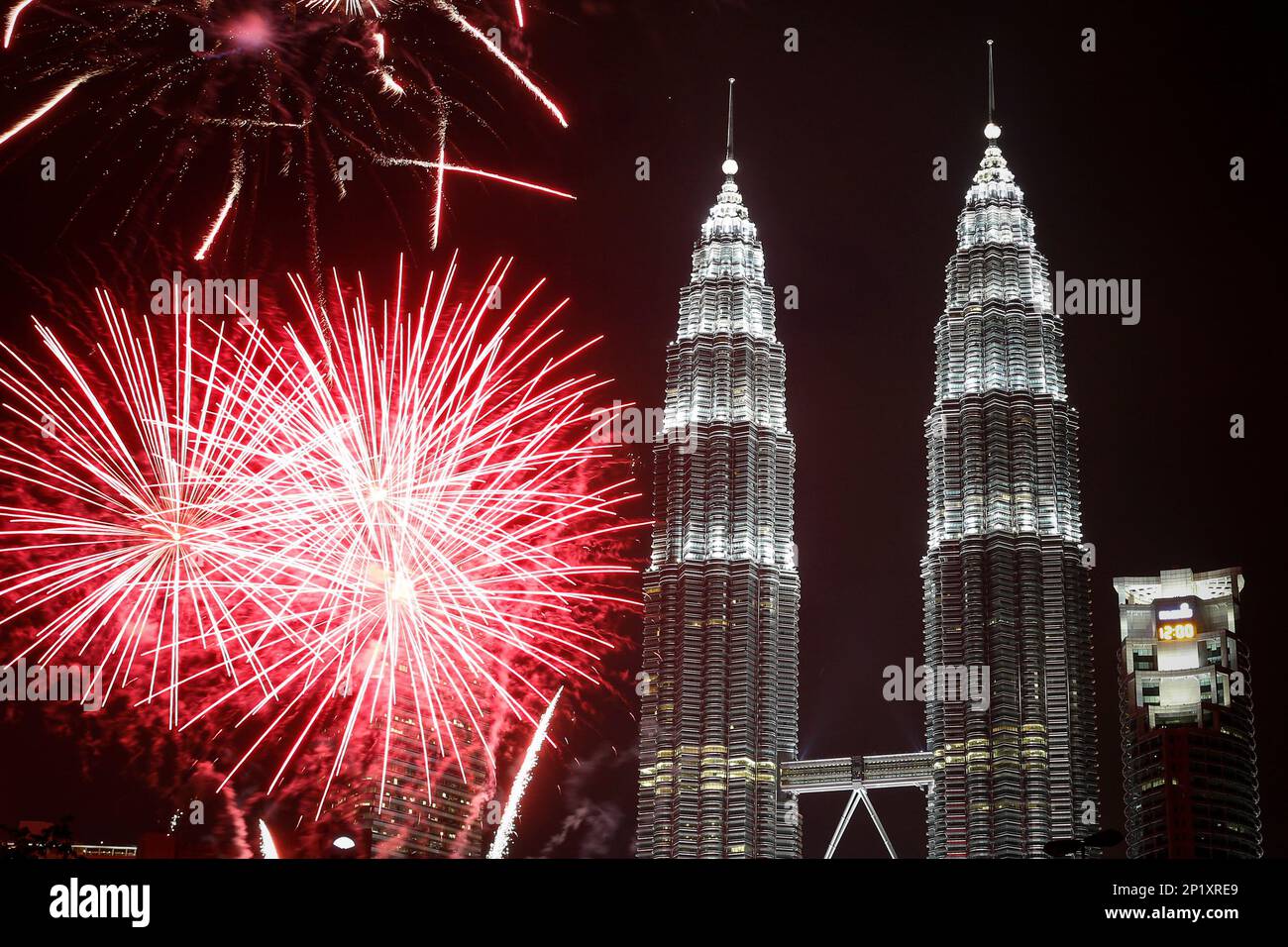 Fireworks explode in front of Malaysia's landmark building, Petronas ...