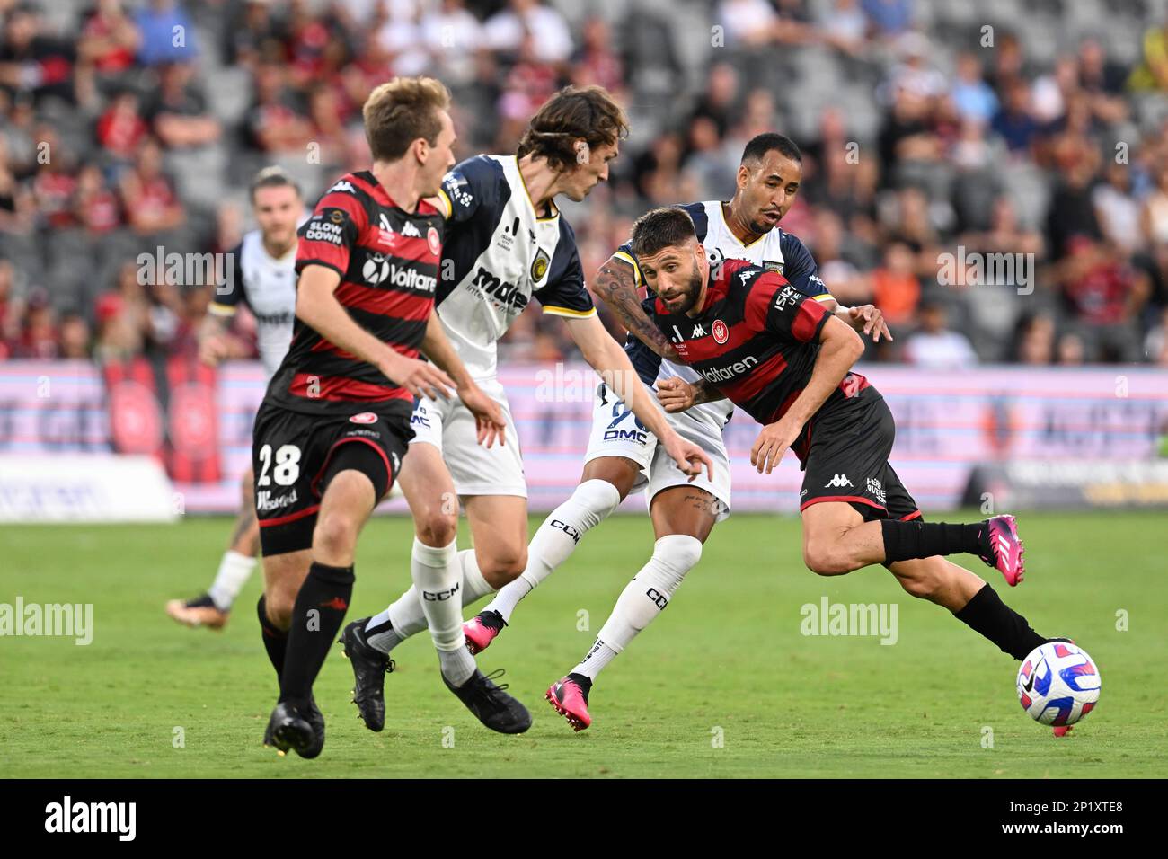 Brandon Borrello of the Wanderers and Marco Túlio of the Mariners ...
