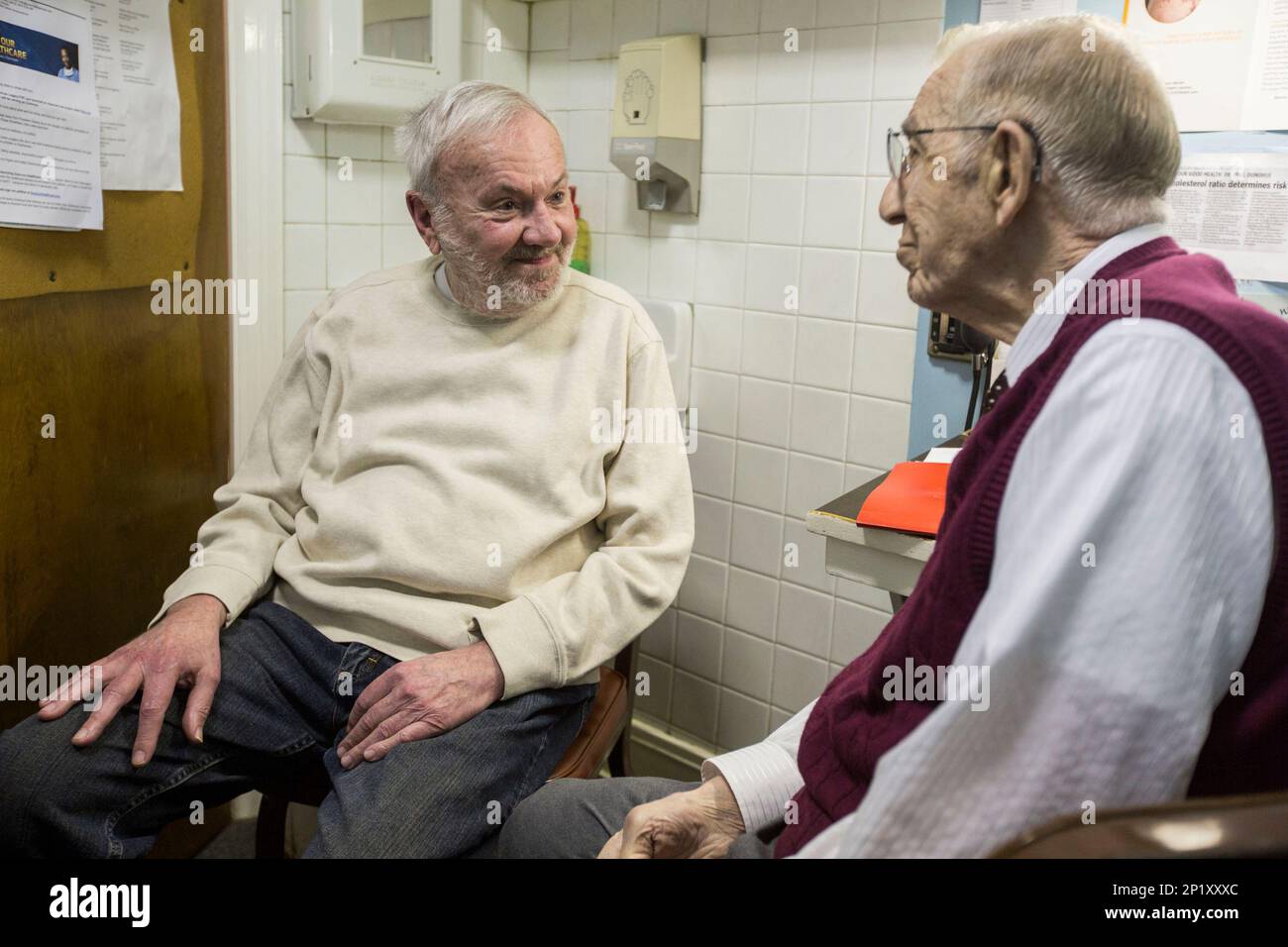 James Harper, left, has an appointment with Dr. Raymond Grandon on his ...