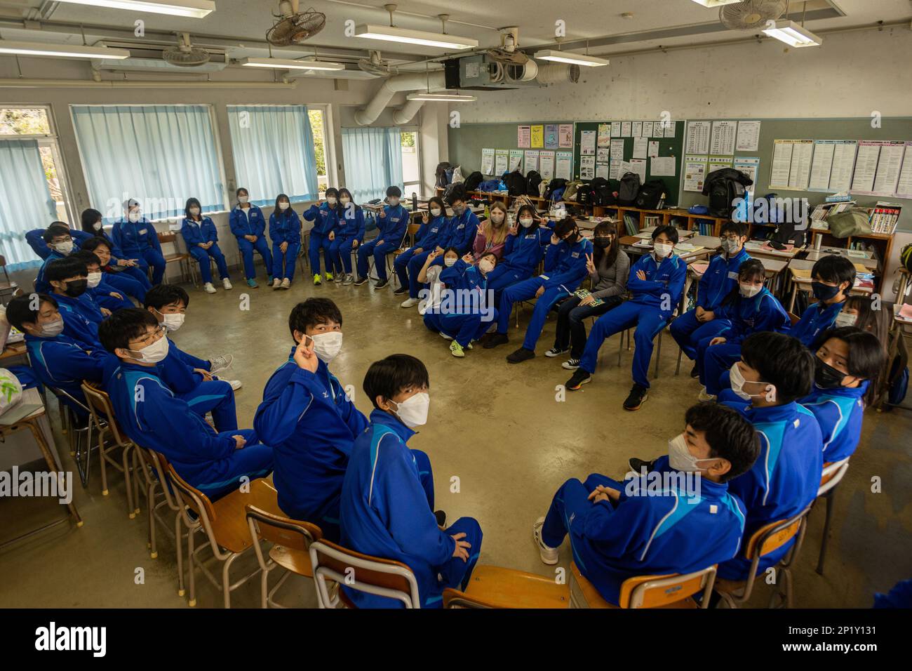American and Japanese students pose for a group photo during Kubasaki ...