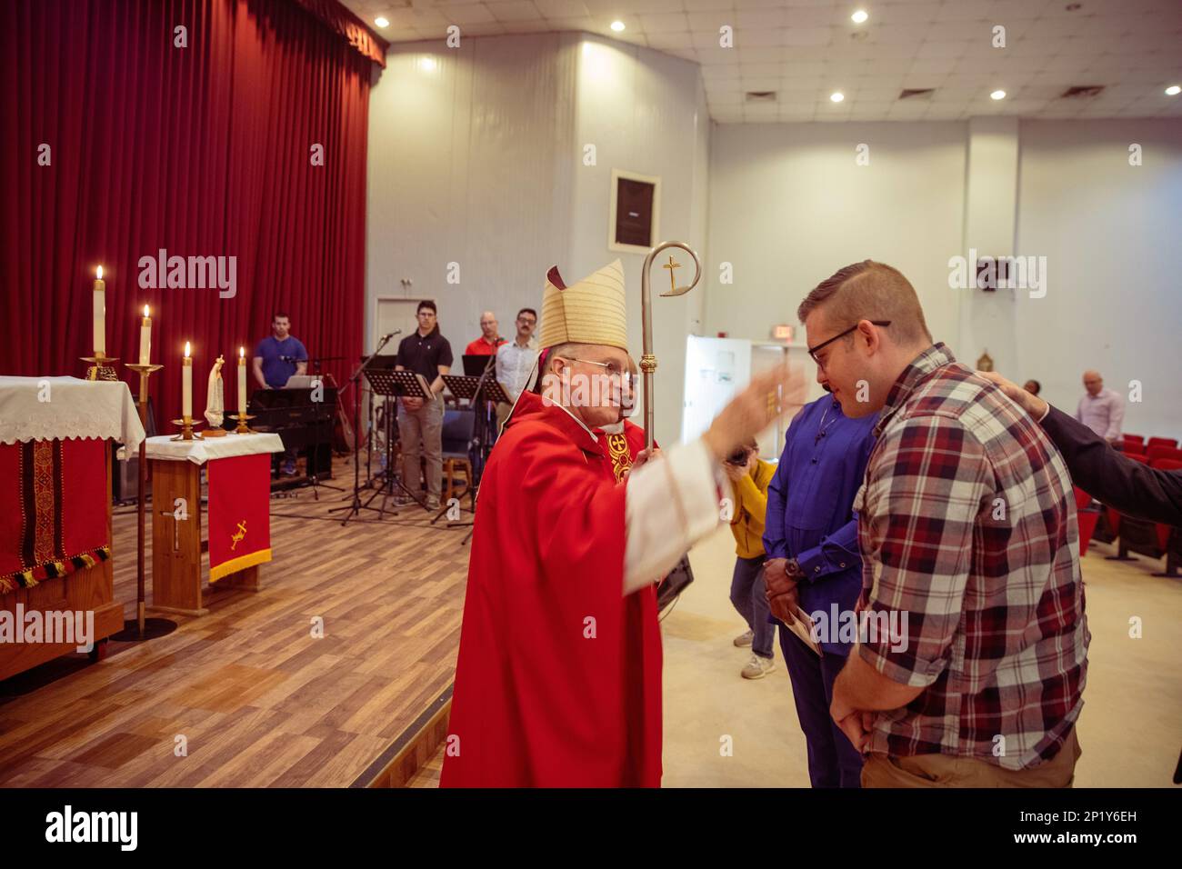 Roman Catholic Archbishop Timothy Broglio performs the sacrament of ...