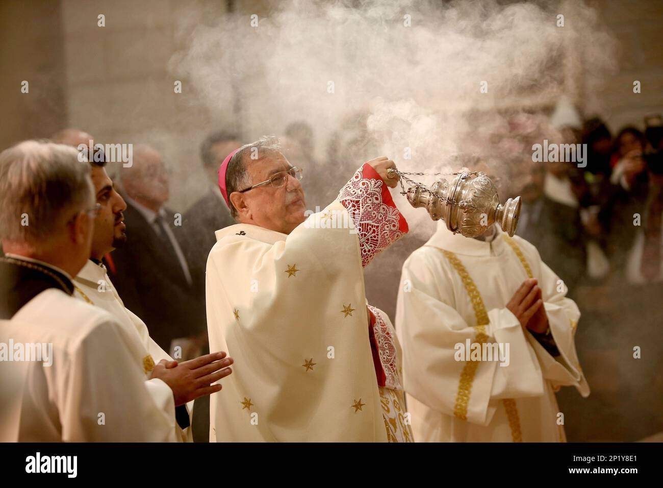 In this Thursday, Dec. 24, 2015 photo, the Latin Patriarch of Jerusalem ...