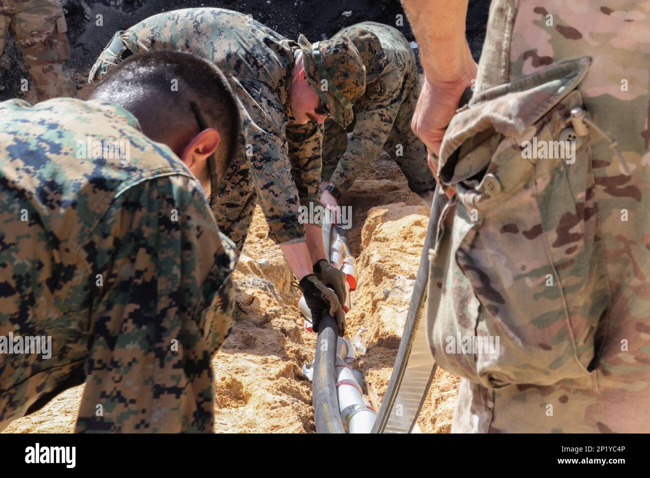 U.S. Marines with Marine Wing Support Squadron (MWSS) 171 and Airmen ...