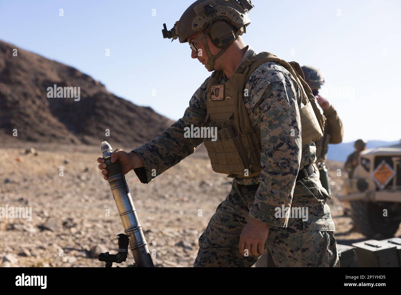 U.S. Marine Corps Cpl. Kai Byrom, a mortarman with 3d Littoral Combat ...