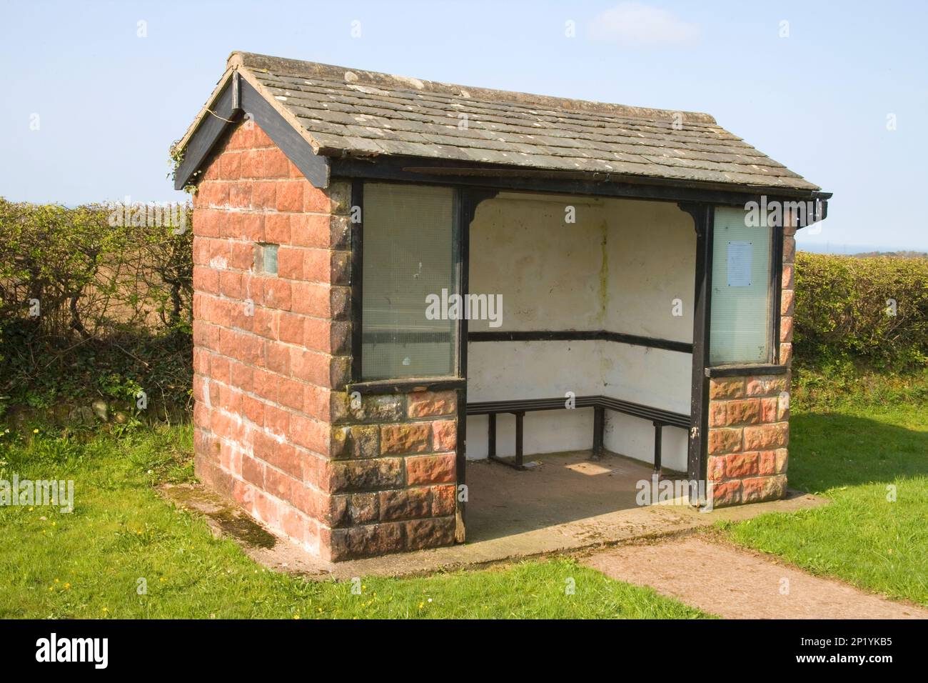 brick built bus shelter cumbria england uk Stock Photo - Alamy