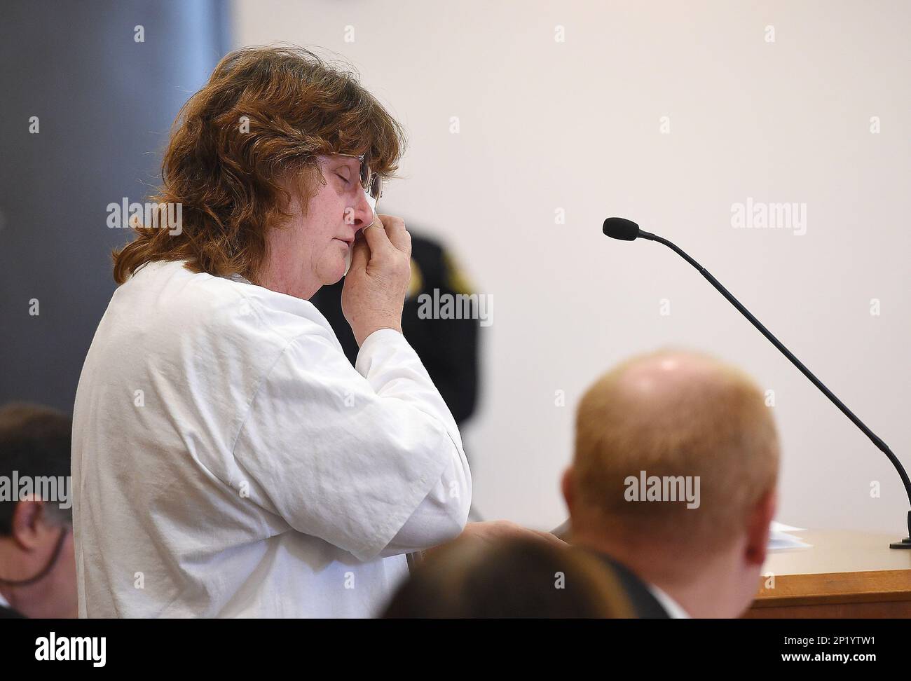 Wilma Cotten, mother of Andrea Bartmess, wipes her eyes while ...