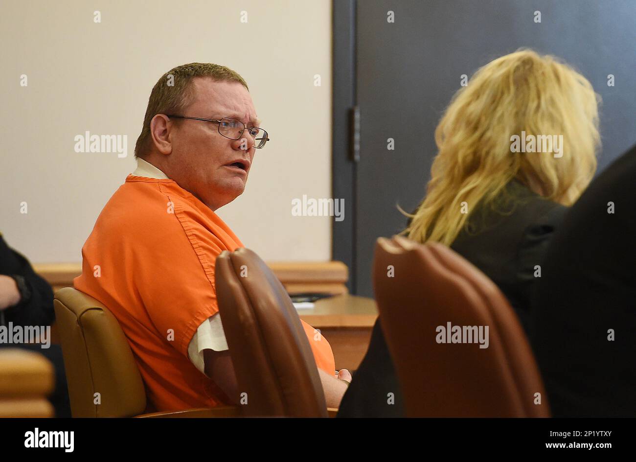 Michael Bensen looks at his defense team during his sentencing hearing ...