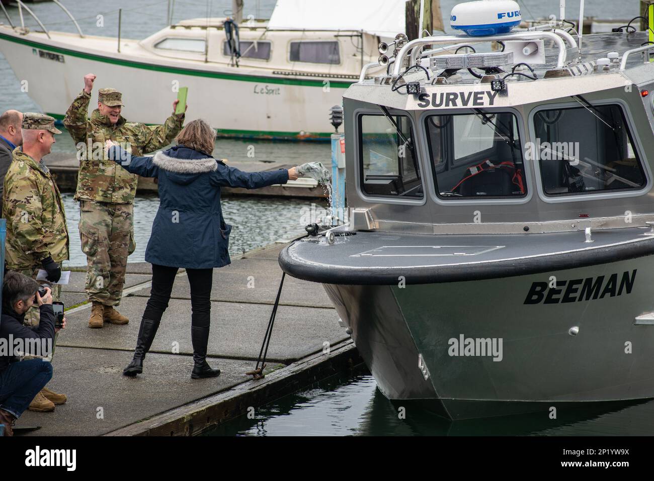 A crowd cheers as Christie Beeman, daughter of Ogden Beeman, who led ...