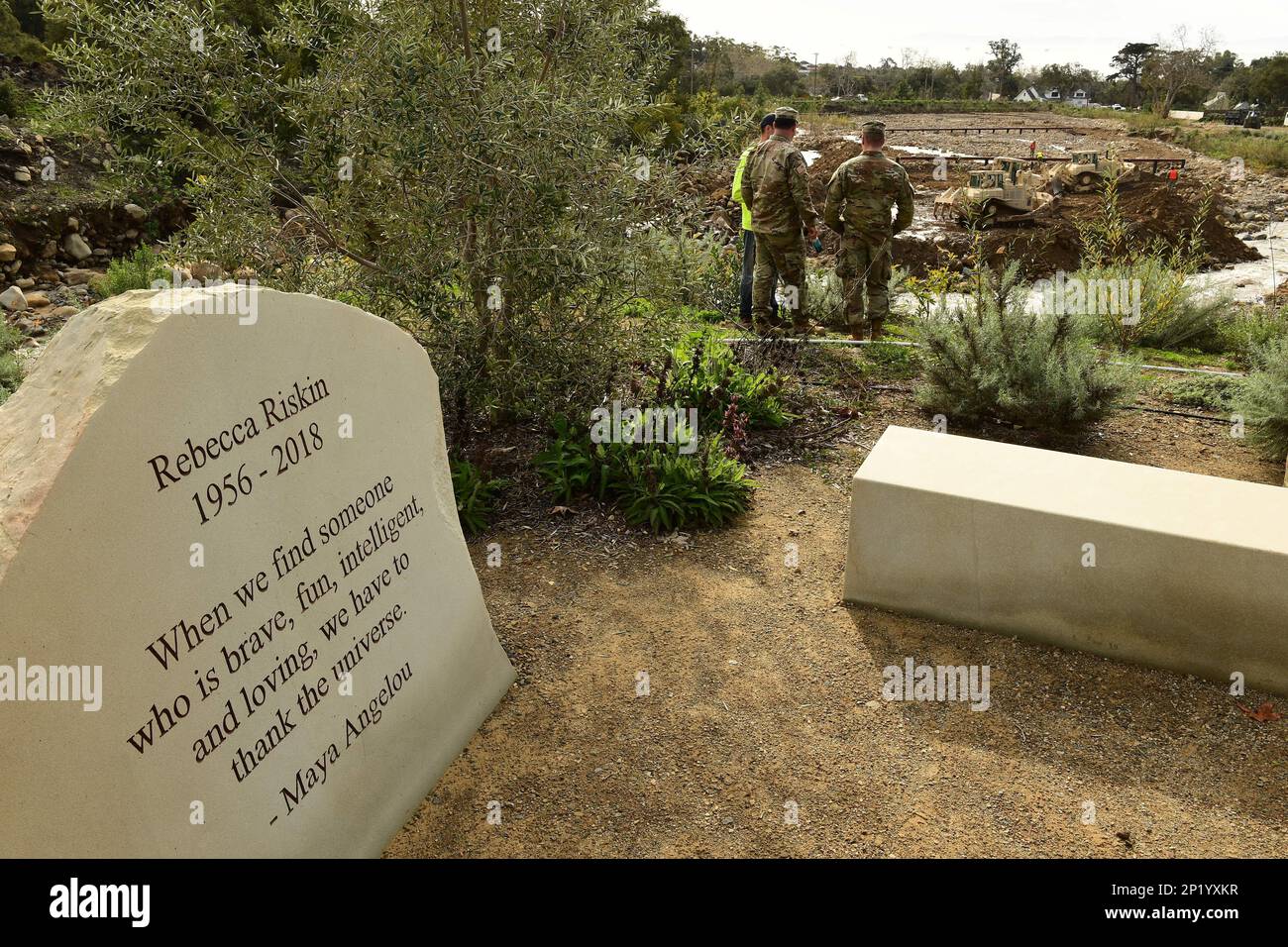 A memorial for Rebecca Riskin is seen above the Randall Road Debris ...