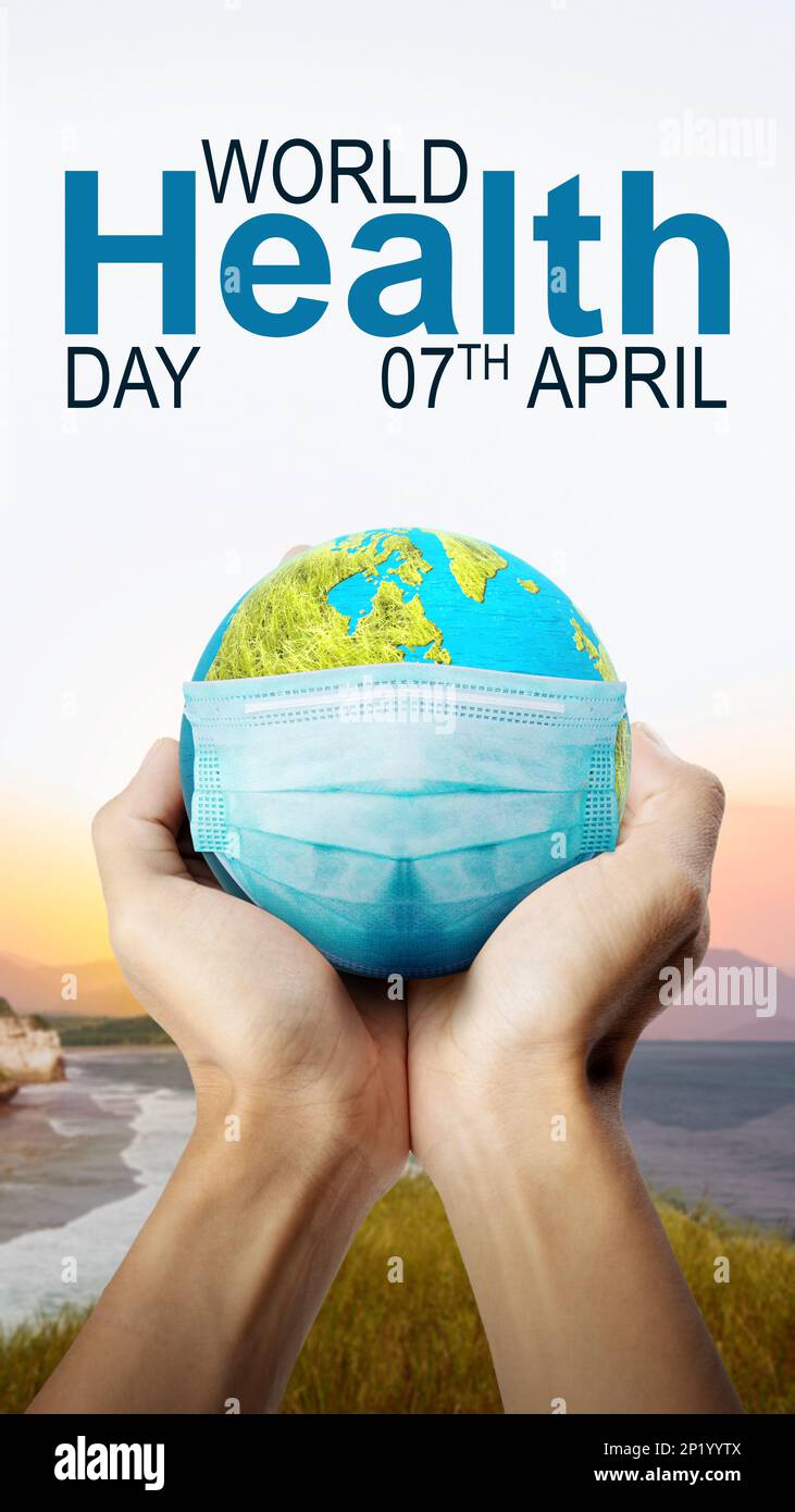 Human hand showing earth with a face mask. World Health Day Concept ...