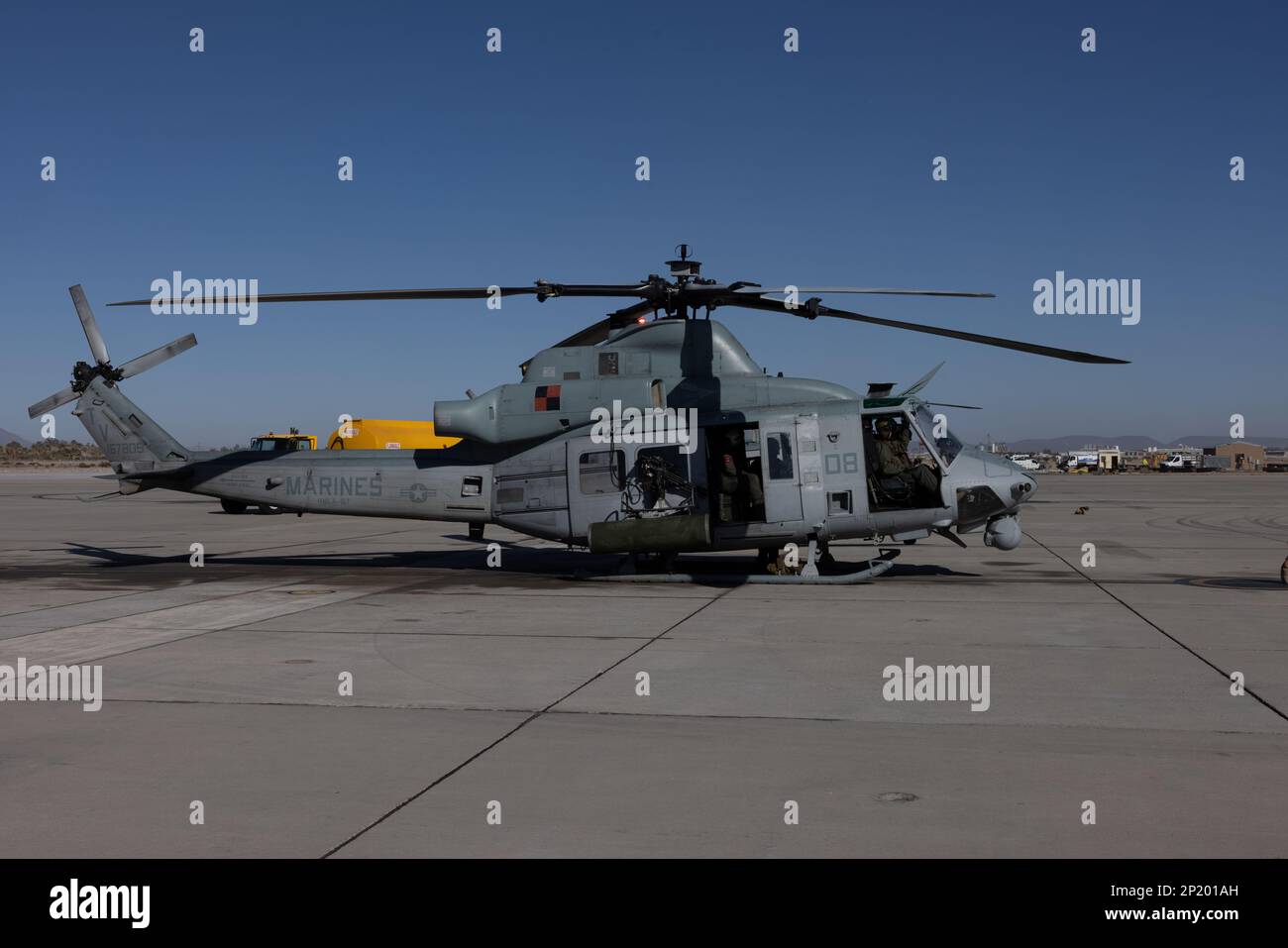 U.S. Marines with Marine Light Attack Helicopter Squadron (HMLA) 167 ...