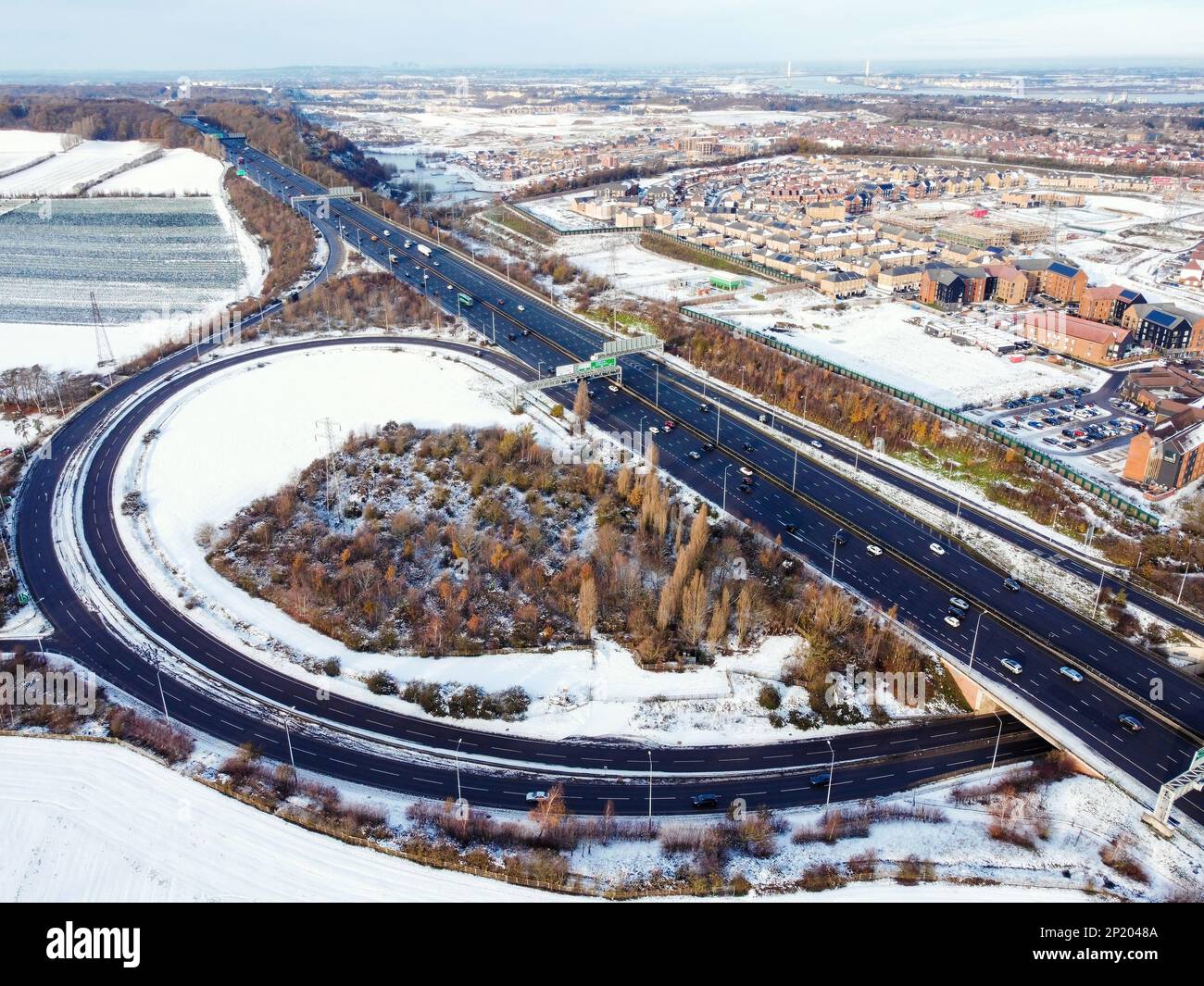 Aerial drone. Ebbsfleet garden city in Kent, covered in snow in ...