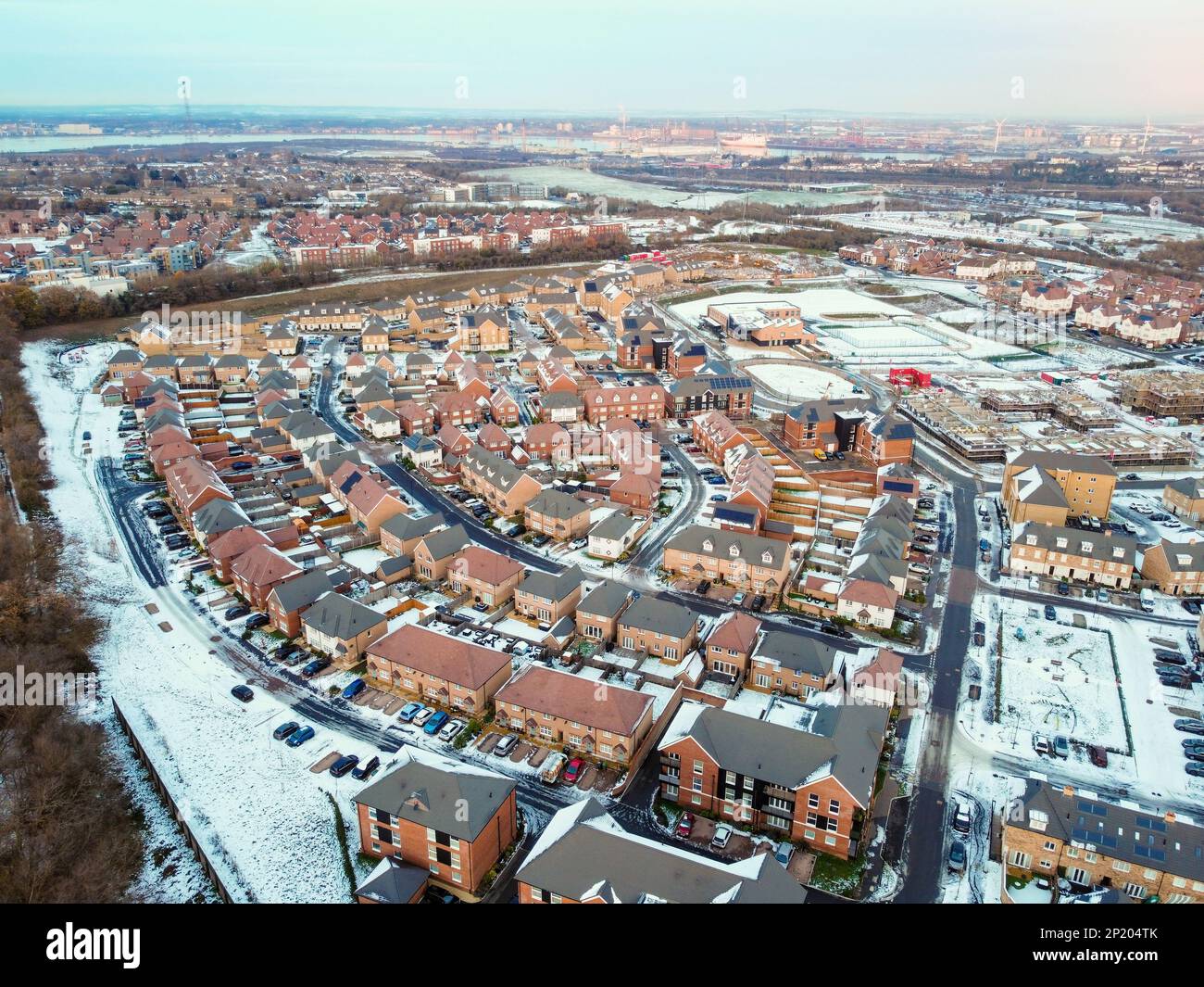 Aerial drone. Ebbsfleet garden city in Kent, covered in snow in ...