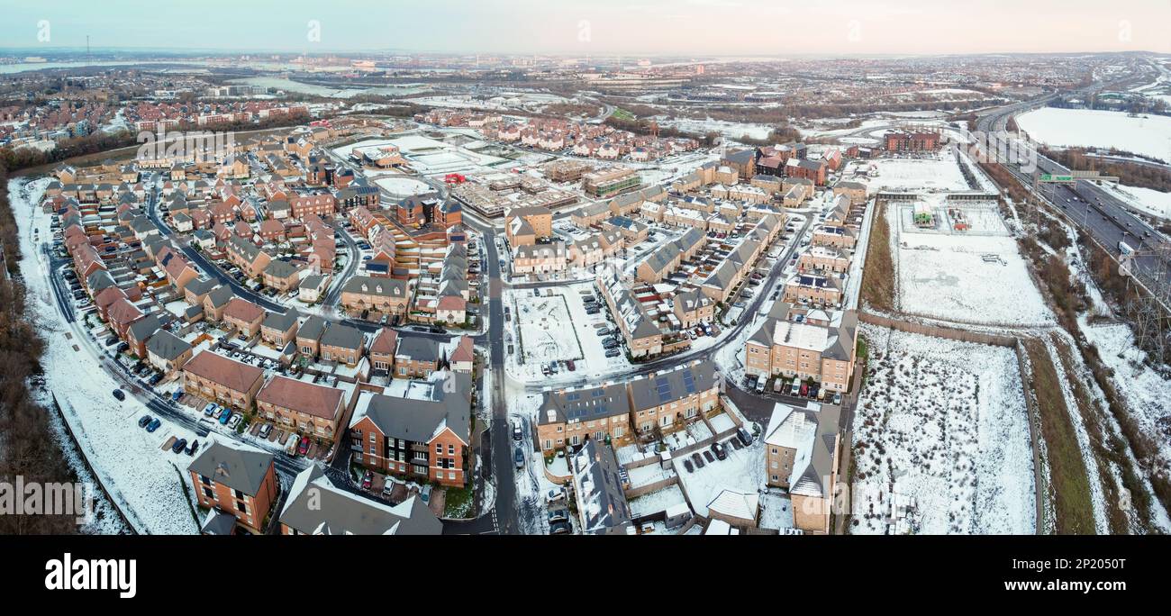 Aerial drone. Ebbsfleet garden city in Kent, covered in snow in ...