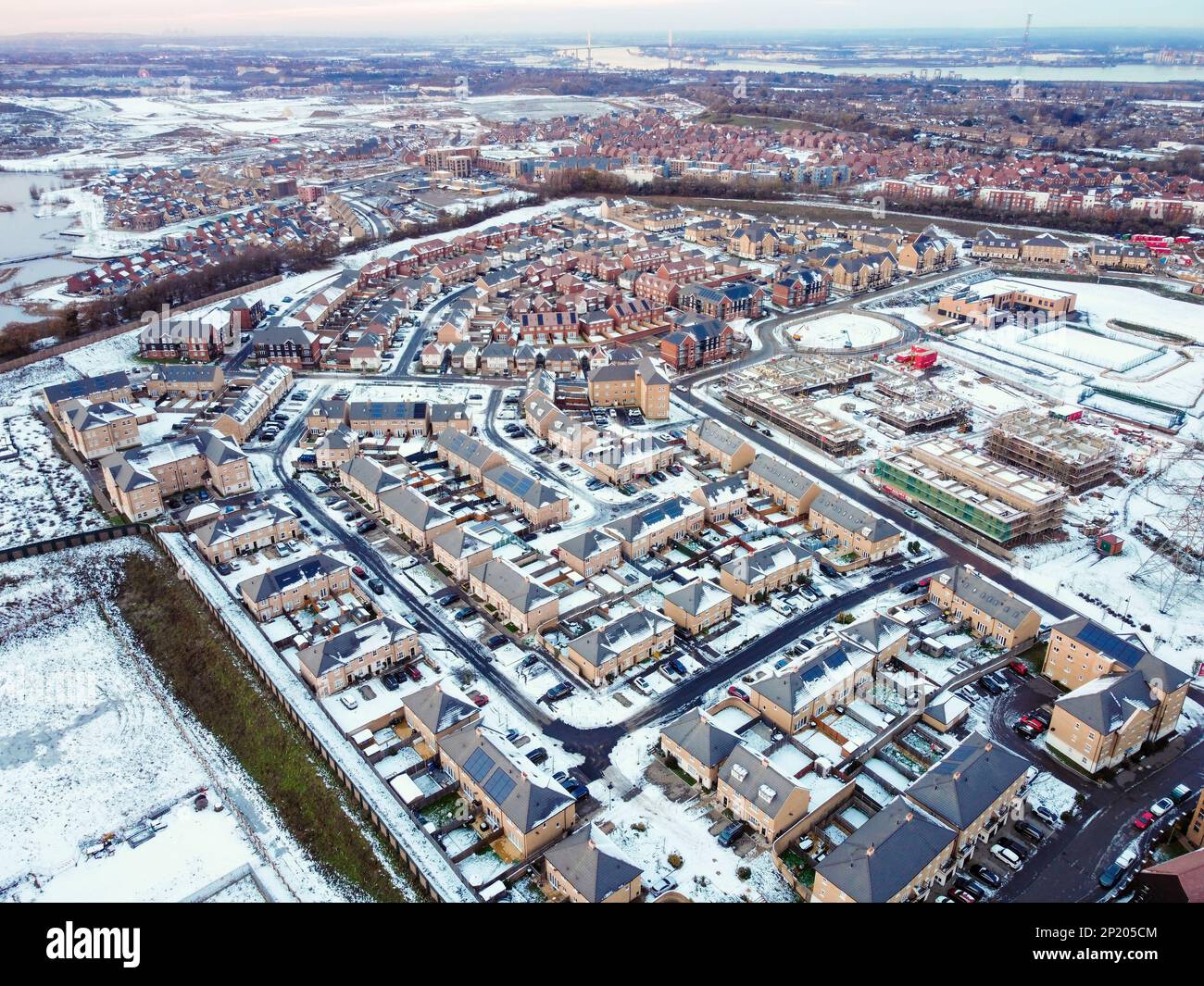 Aerial drone. Ebbsfleet garden city in Kent, covered in snow in ...