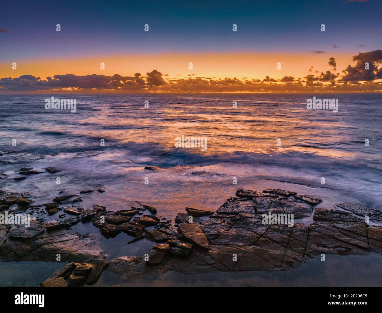 Aerial sunrise seascape with clouds at Spoon Bay in Wamberal on the ...