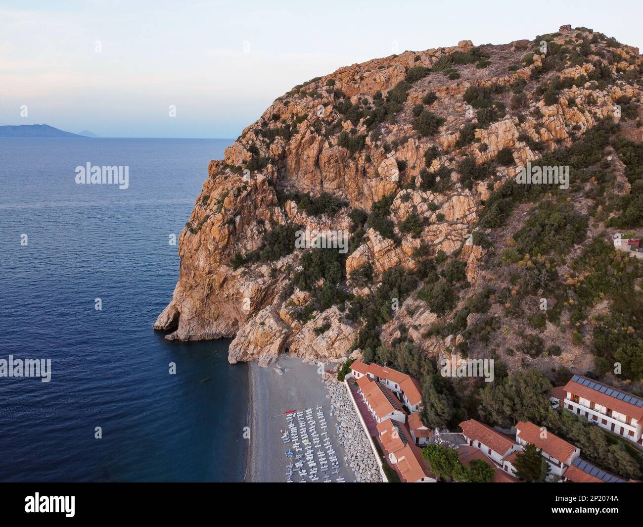 Aerial drone. Capo Calava bay and beach, with several holiday parks ...