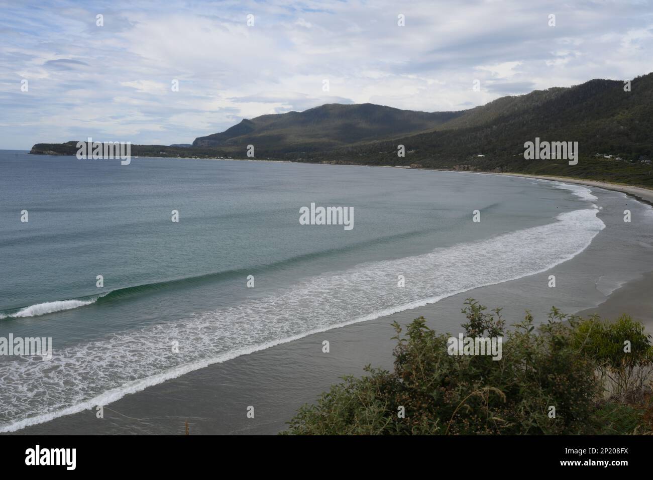 Eaglehawk Neck bay Tasman peninsula, Tasmania showing beach curving ...