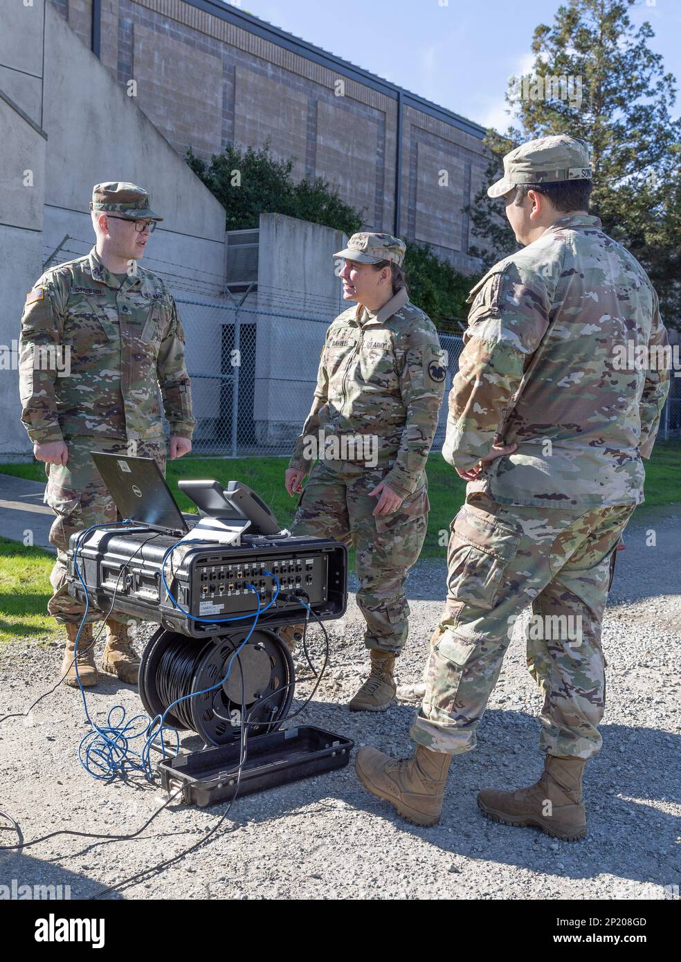 Staff Sgt. Jason Christensen (Left), a military Chemical, Biological ...