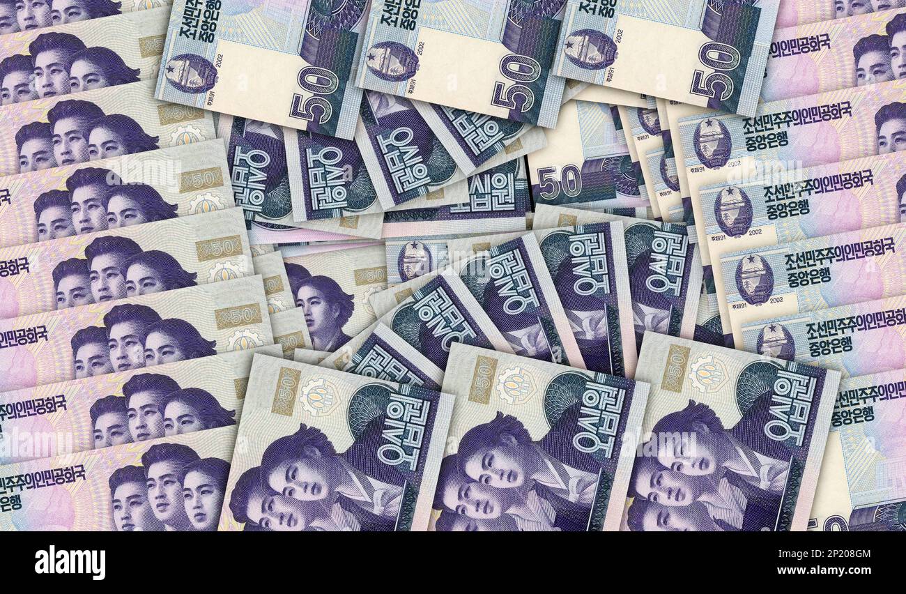 North Korea Won banknotes in a cash fan mosaic pattern. North Korean ...