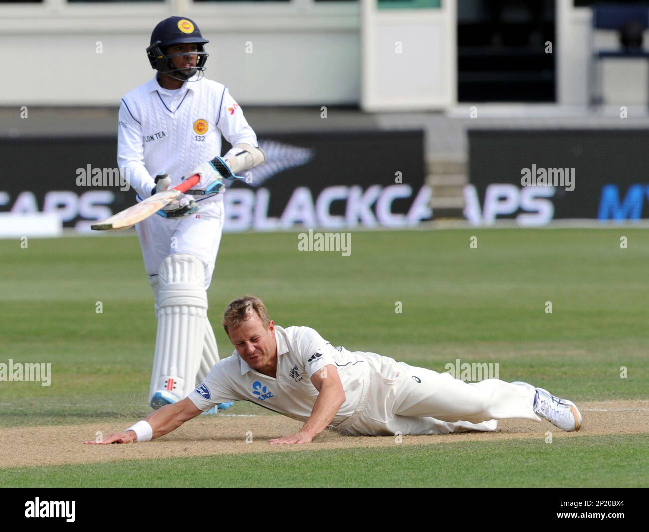 New Zealand’s Neil Wagner takes a dive after bowling in front of Sri ...