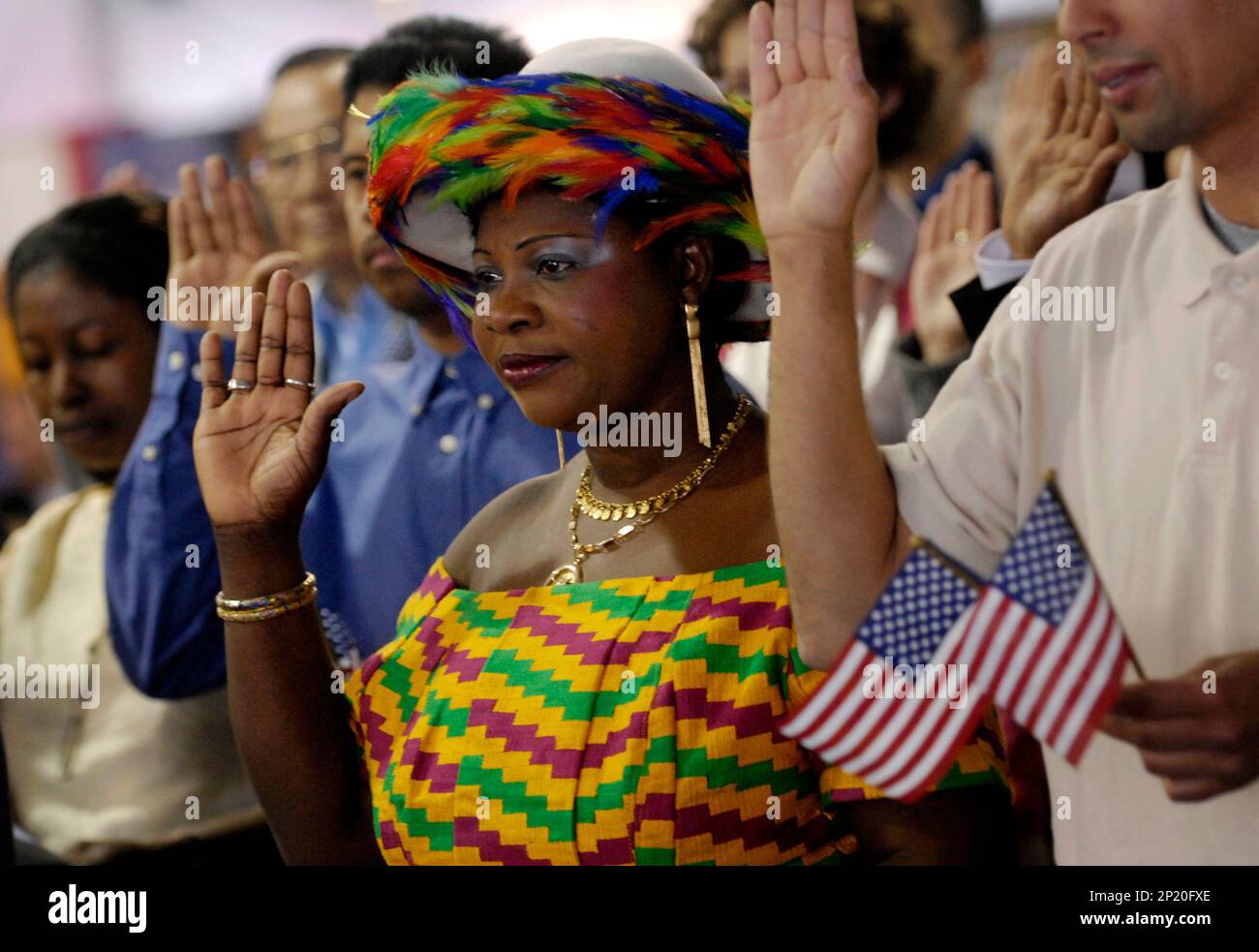 Ghanaian Mary Gyimah is sworn-in as a U.S. Citizen during a U.S ...