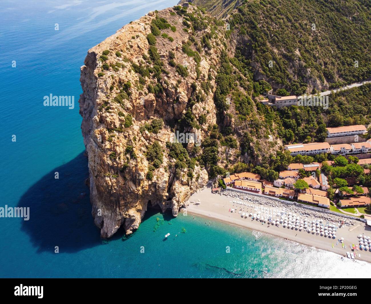 Aerial drone. Capo Calava bay and beach, with several holiday parks ...