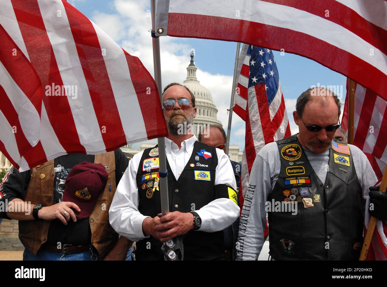 Stephen Maley of Maryland, center, and Woody Wagner, hold hold American ...