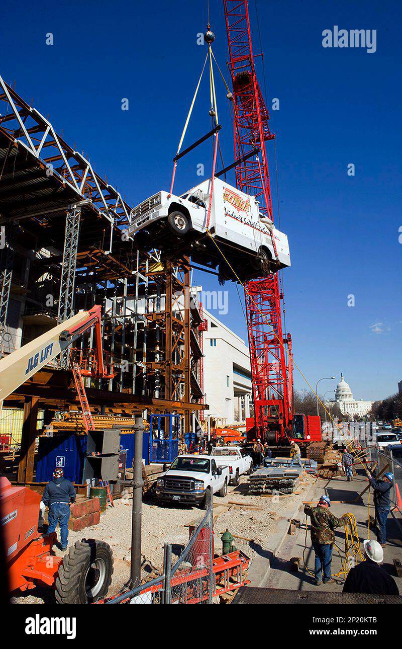 Cranes Dc Conus Satalite Truck Being Lifted By Crane Into The New
