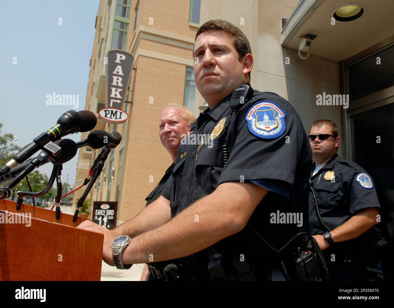 USCP Fraternal Order of Police Chairman Andy Maybo, center, talks with ...