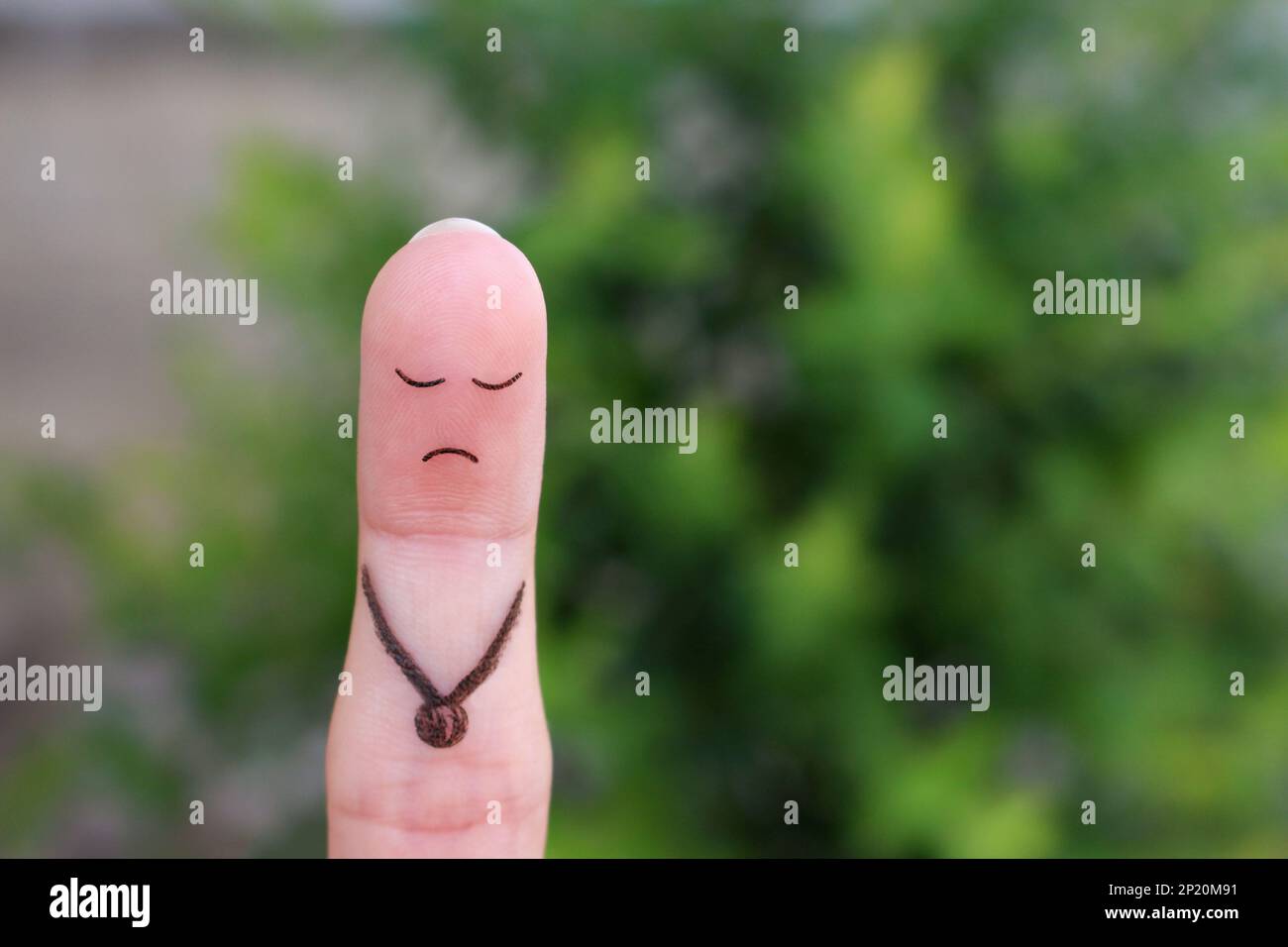 Finger art of a lonely sad man Stock Photo - Alamy