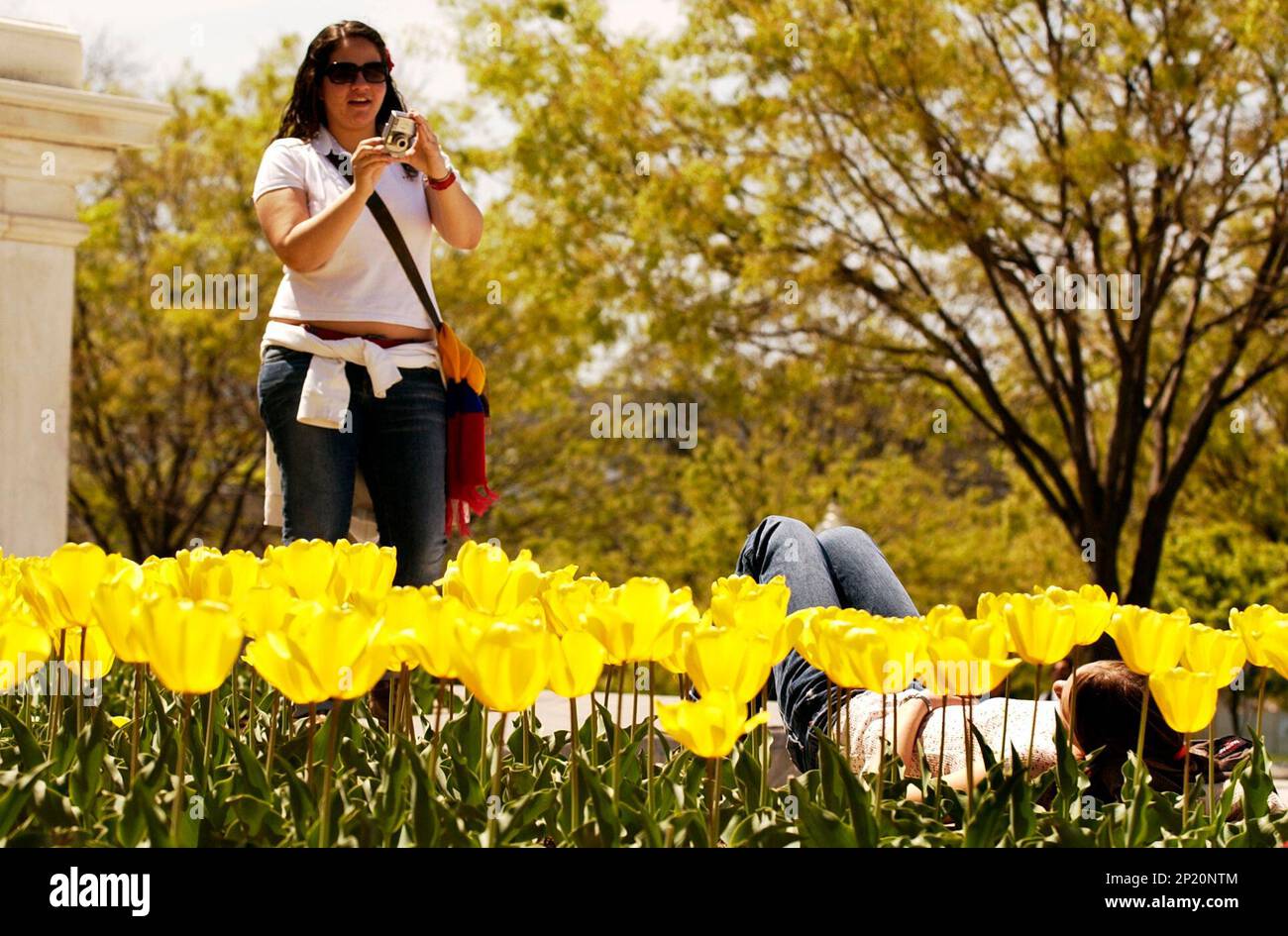 Maria Narvaez from Columbia, takes a picture of her friend Ann ...