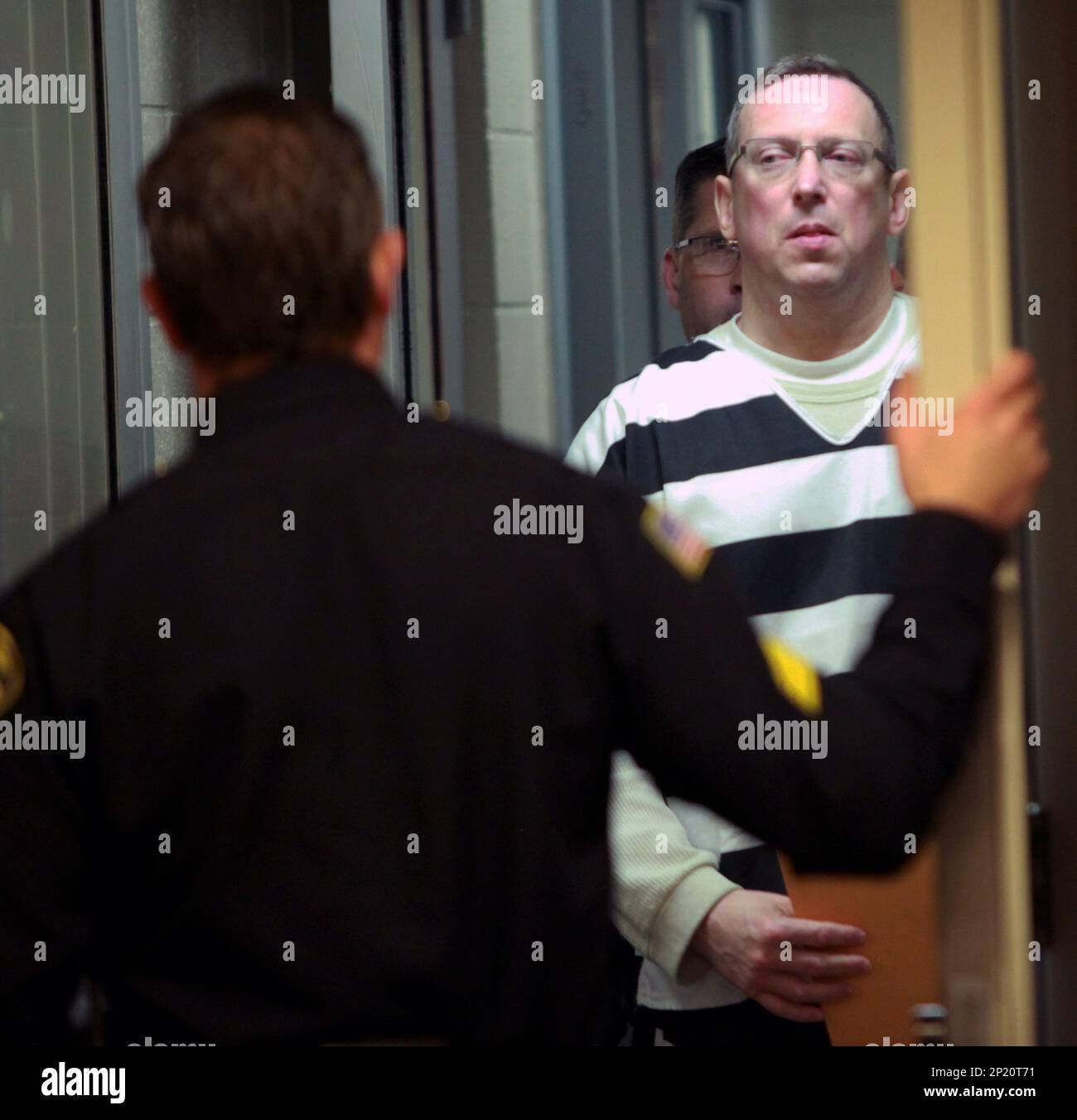 Clark Fredericks is brought into State Superior Judge Thomas J ...