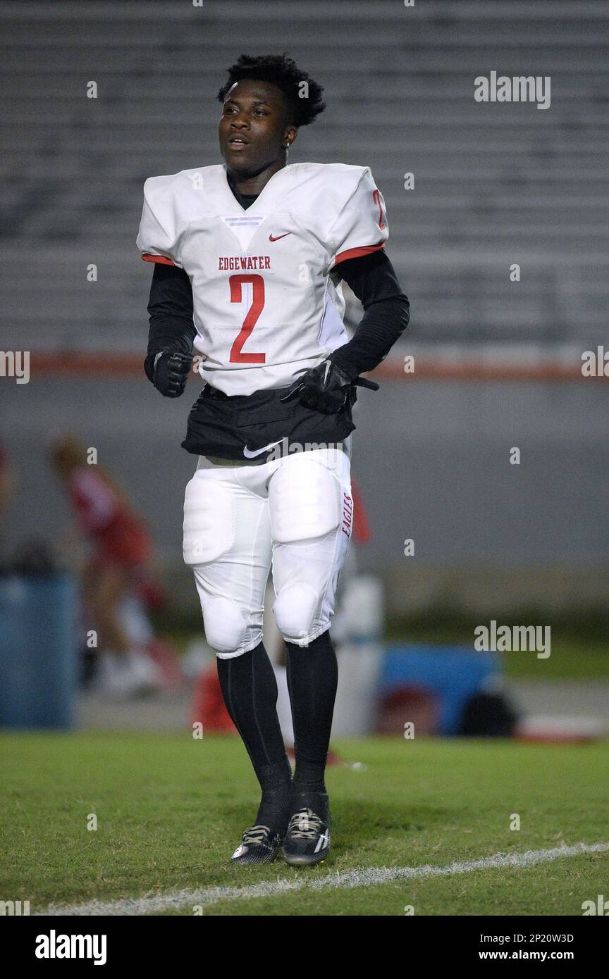 Edgewater's Craig Rucker (2) warms up before a high school football ...