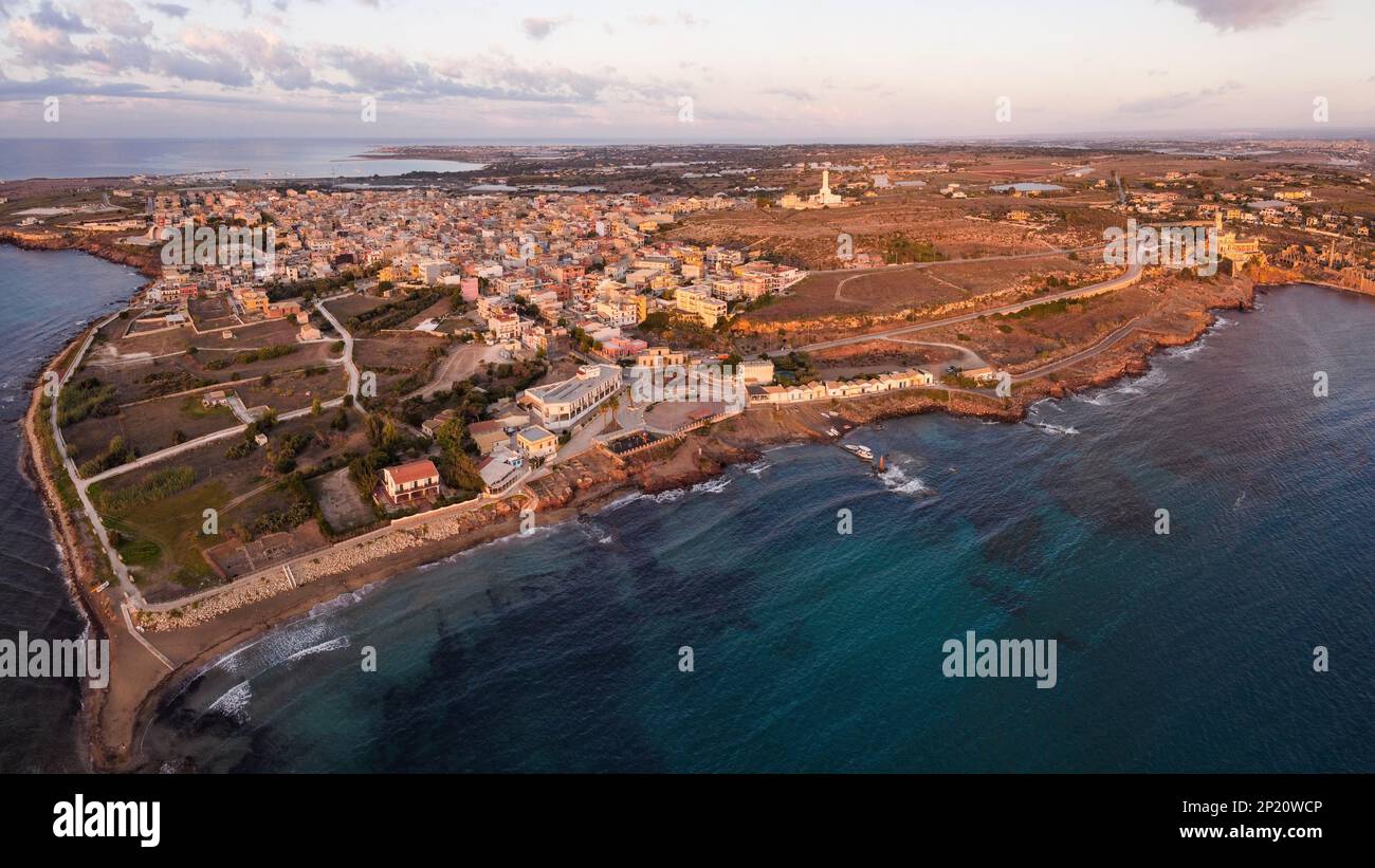 Aerial drone. Rocky coastline and island at Portopalo di Capo Passero ...