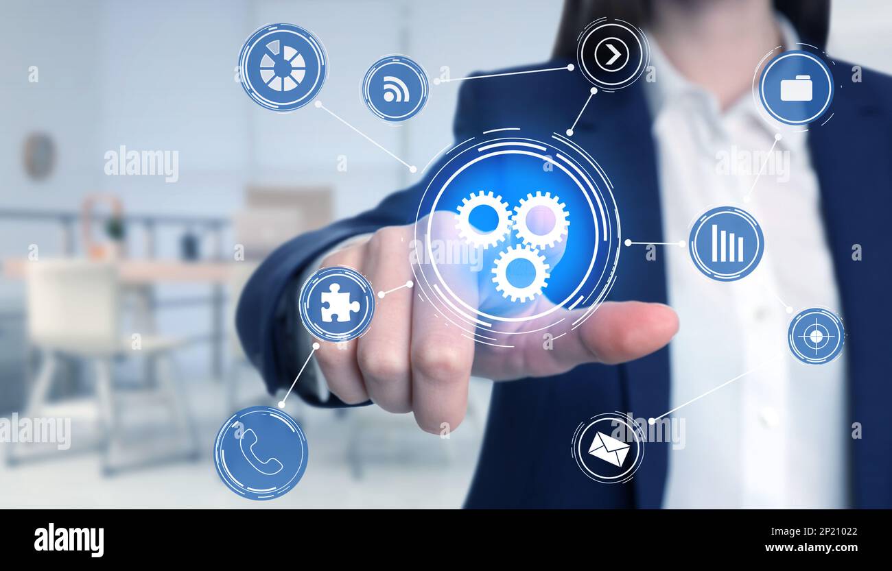 Business process. Woman touching virtual screen with different icons in ...