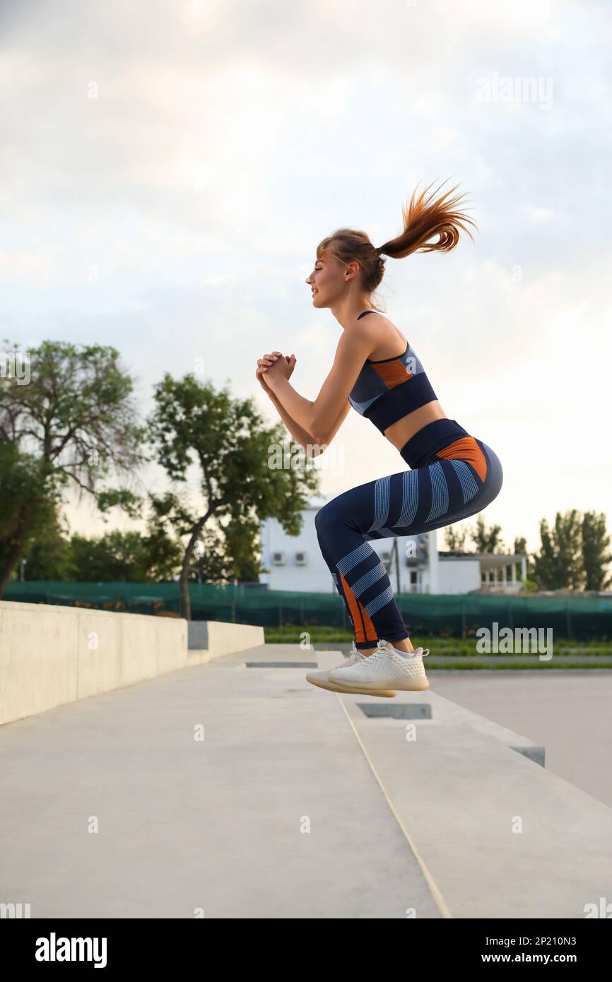 Fitness girl on steps hi-res stock photography and images - Alamy